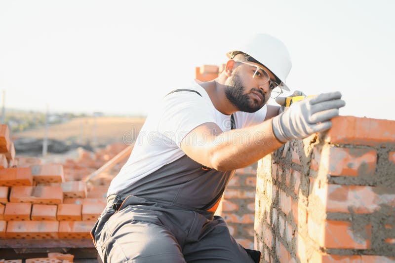 Indian Construction Worker Man in Work Clothes and a Construction ...