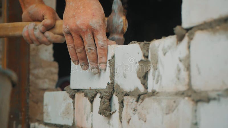 Construction Worker or Mason Laying Bricks and Creating Walls ...