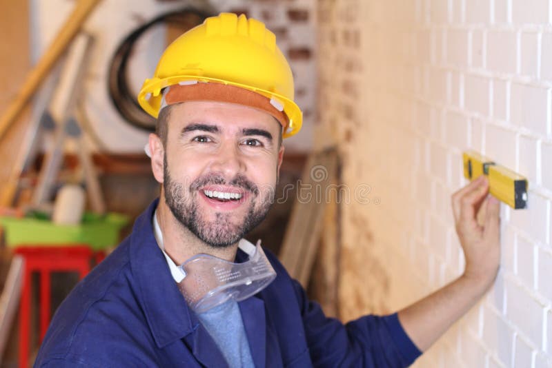 Construction Worker Measuring the Correct Level with Tool Stock Image ...