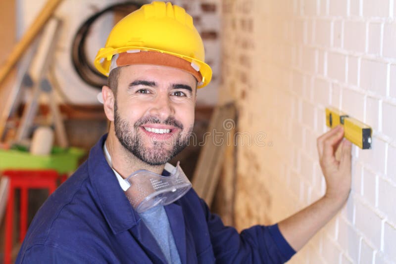 Construction Worker Measuring the Level Stock Photo - Image of builder ...