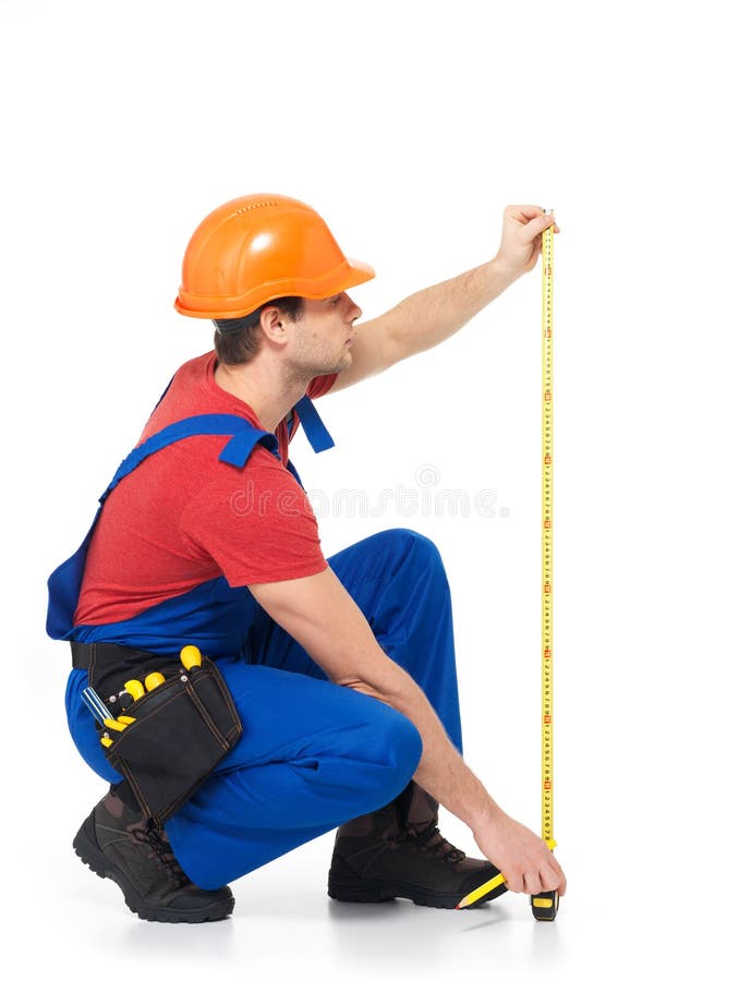 Construction Worker Measuring the Wall Stock Photo - Image of foreman ...