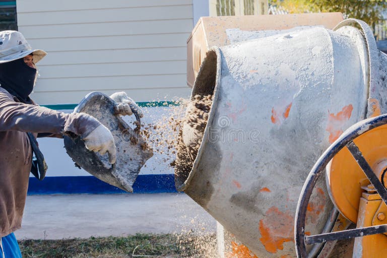 Construction Worker Mixing Cement. Editorial Stock Image - Image of ...