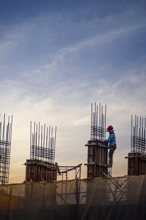 Construction Worker Mounting Concrete Formwork with Crane during Stock ...