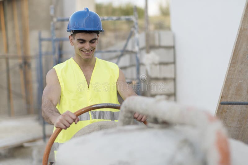 Construction Worker Moving Mixer in Masonry Site Stock Photo - Image of ...