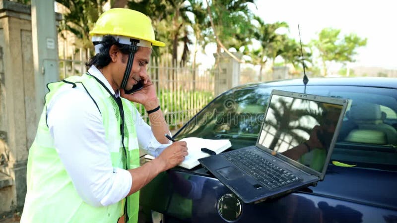 Construction Worker Multitasking with Phone Stock Footage - Video of ...