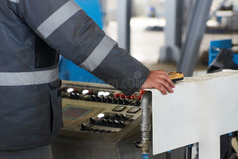 Construction Worker Operating a Crane with a Control Panel Stock Image ...