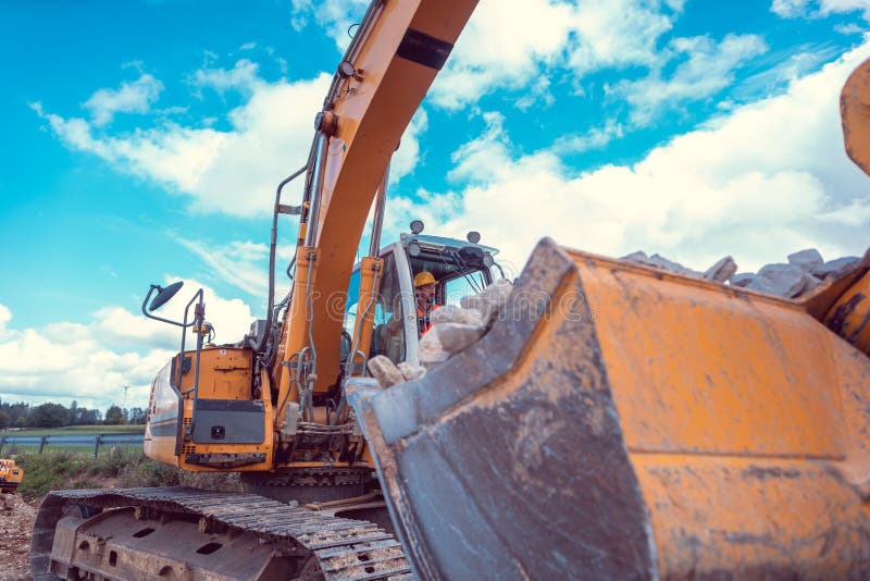 Construction Worker Operating the Crawler Excavator Stock Photo - Image ...