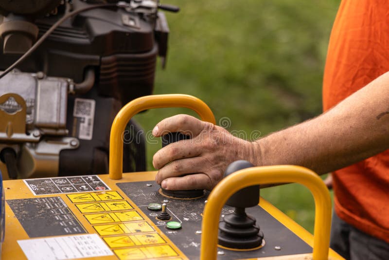 Construction Worker Operating Machinery with Control Panel Stock Photo ...