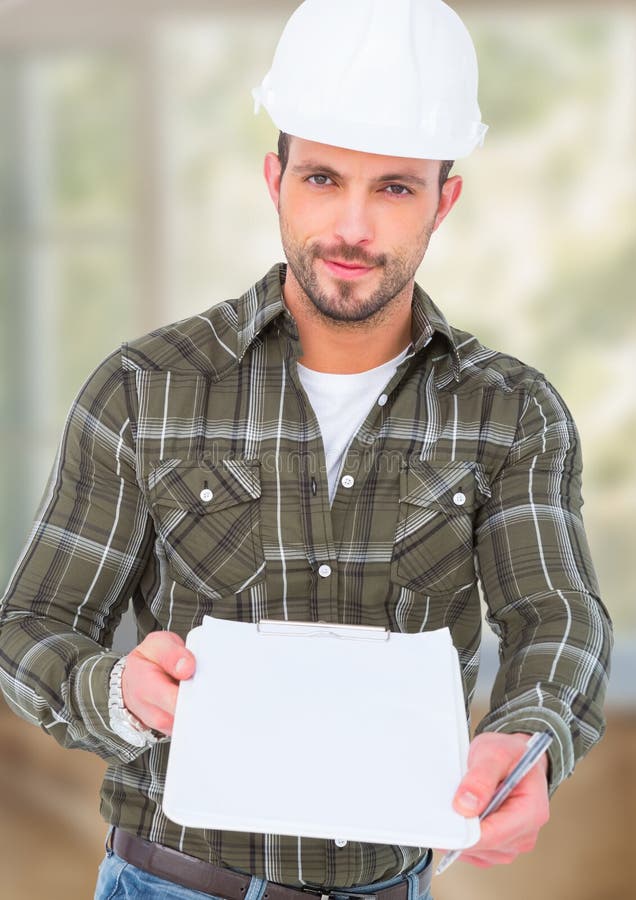 Construction Worker with Pen Chart in Front of Construction Site Stock ...