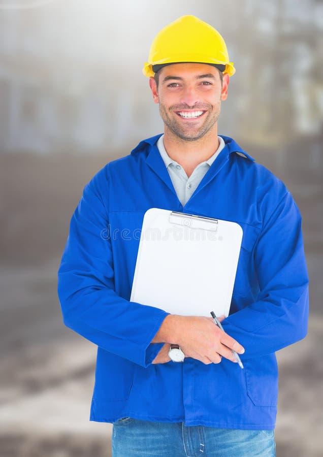 Construction Worker with Pen Chart in Front of Construction Site Stock ...