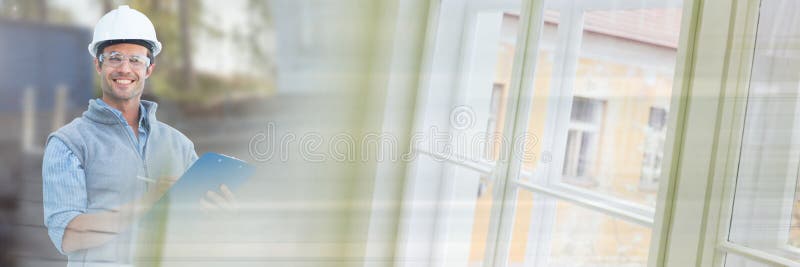 Construction Worker with Pen Chart in Front of Construction Site with ...
