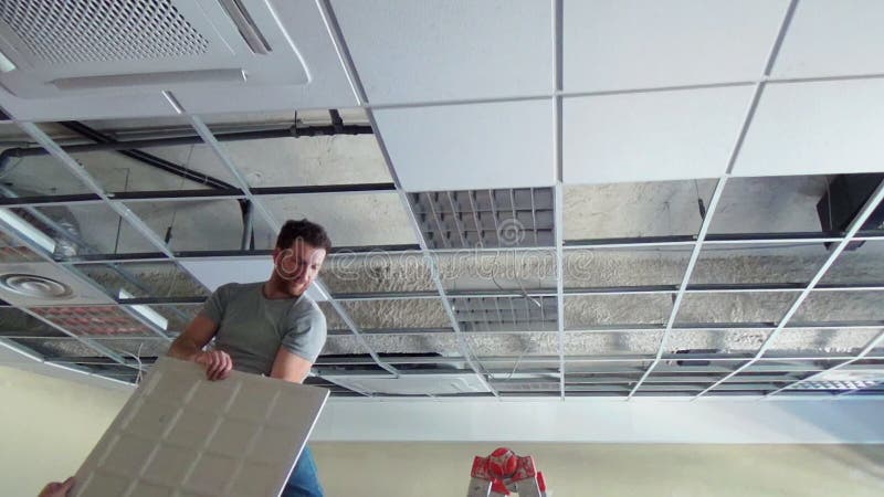 Construction Worker Performs a Suspended Ceiling Stock Footage - Video ...