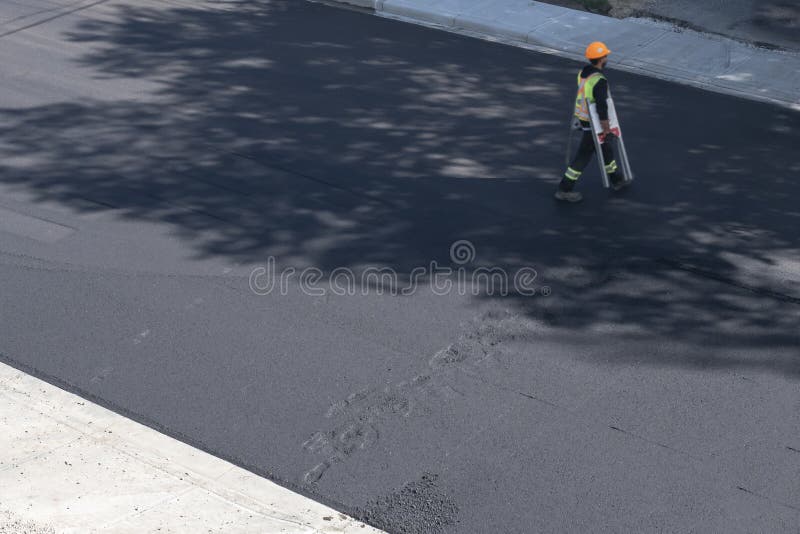 Construction Worker Placing Signs on New Asphalt Editorial Photo ...