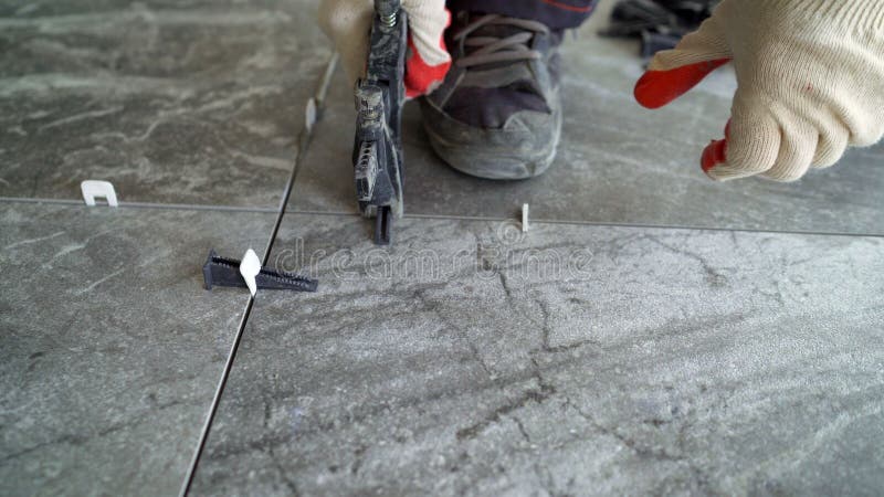 Construction Worker Placing Tile Leveling System Wedges and Clips Stock ...