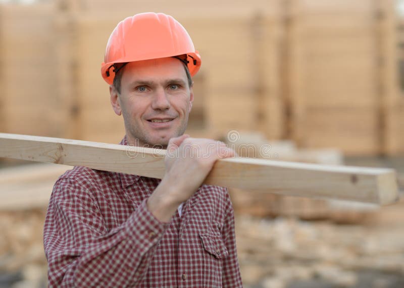Construction Worker with Plank Stock Photo - Image of plank, site: 28687370
