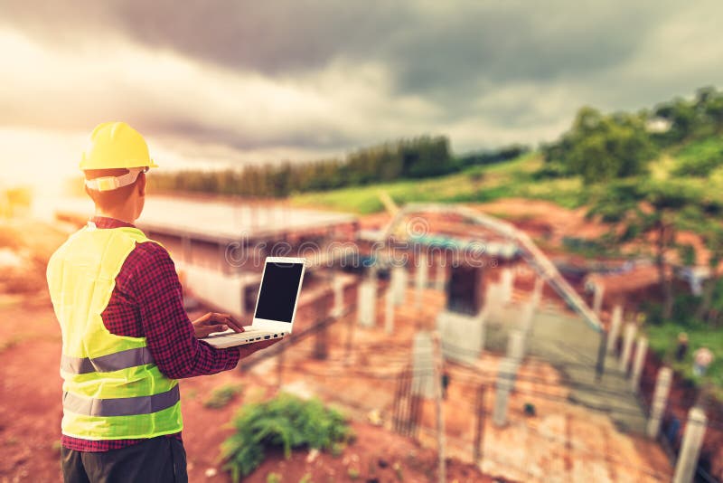 Construction Worker Planning Use Laptop for Working and Checking Site ...