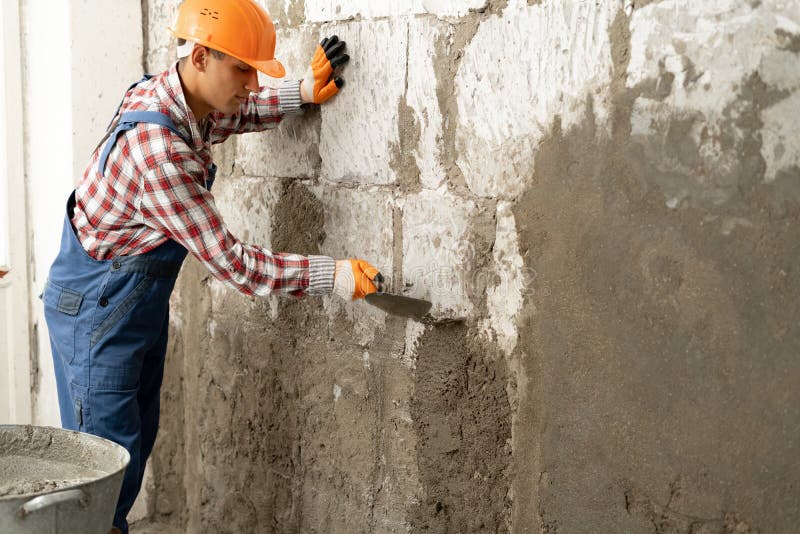 Construction Worker Plasterer with Trowel Plastering Wall Cement Mortar ...
