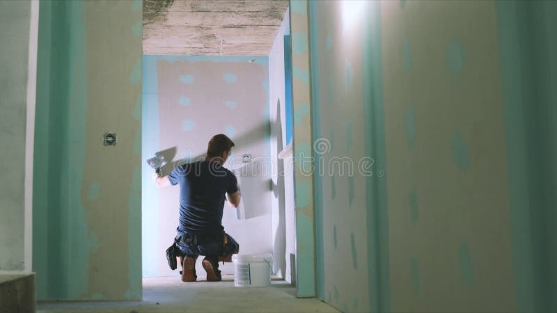 Construction Worker Using Laser Distance Meter in Building Stock Video ...