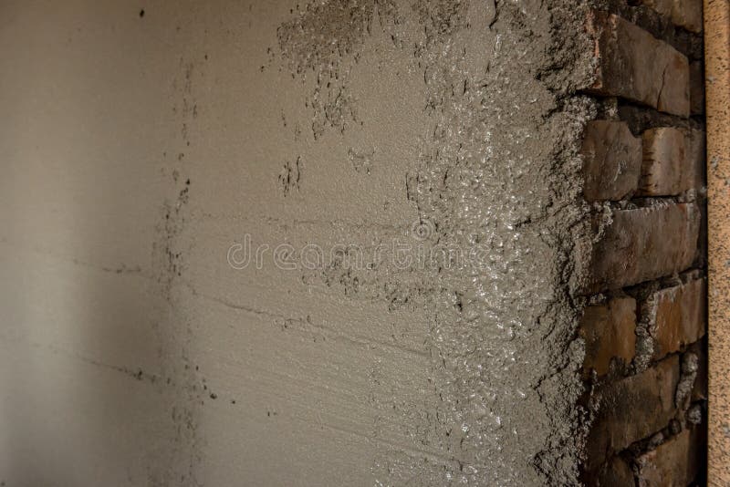 Construction Worker Plastering Wall Using Pneumatic Textured Spray Gun ...