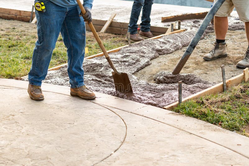 Construction Worker Pouring Wet Deck Cement into Wooden Frame Stock ...