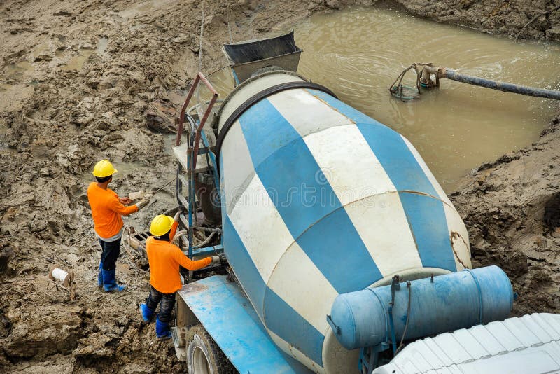 Construction Worker Pouring Cement Stock Image - Image of mixing, build ...
