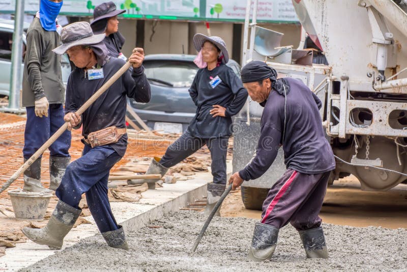 Construction Worker is Doing the Road Editorial Photo - Image of girl ...