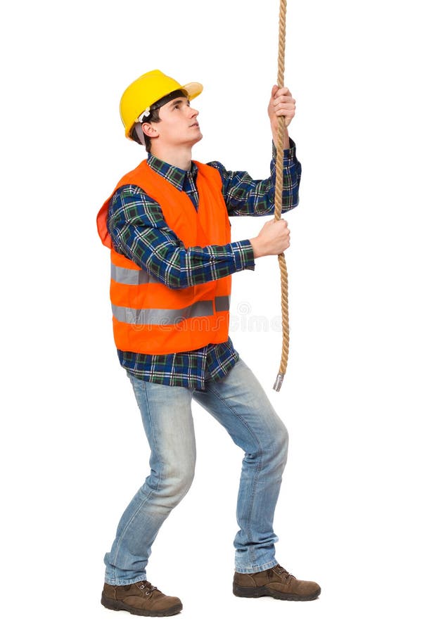 Construction Worker Pulling a Rope. Stock Photo - Image of holding ...