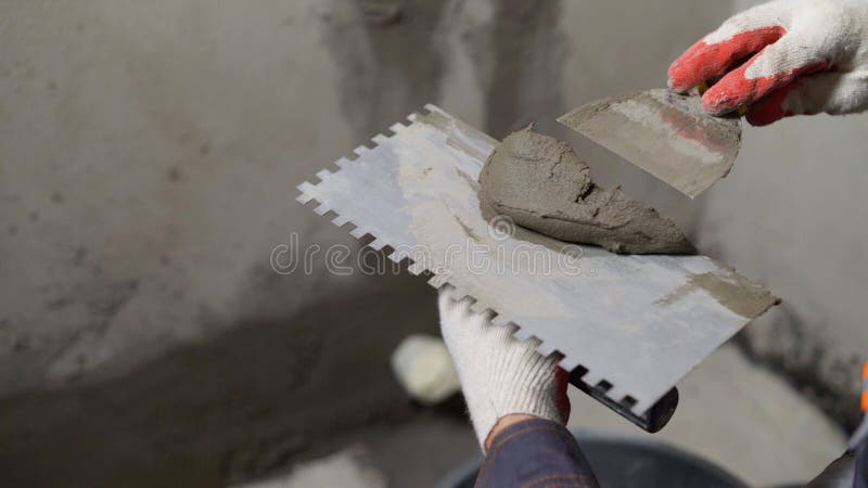 Construction Worker Applying Cement on Trowel with Spatula Stock Image ...