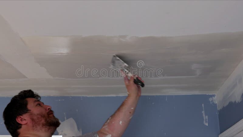 Construction Worker with Putty for Gypsum Plasterboard Ceiling Stock ...