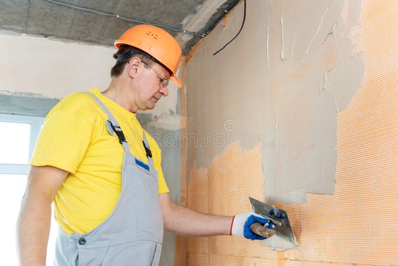 The Construction Worker Putty a Wall Stock Photo - Image of repairman ...