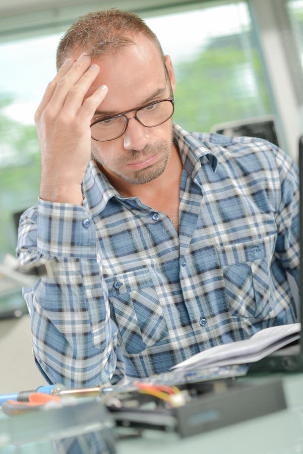 Construction Worker Reading Manual Stock Photo - Image of instruct ...