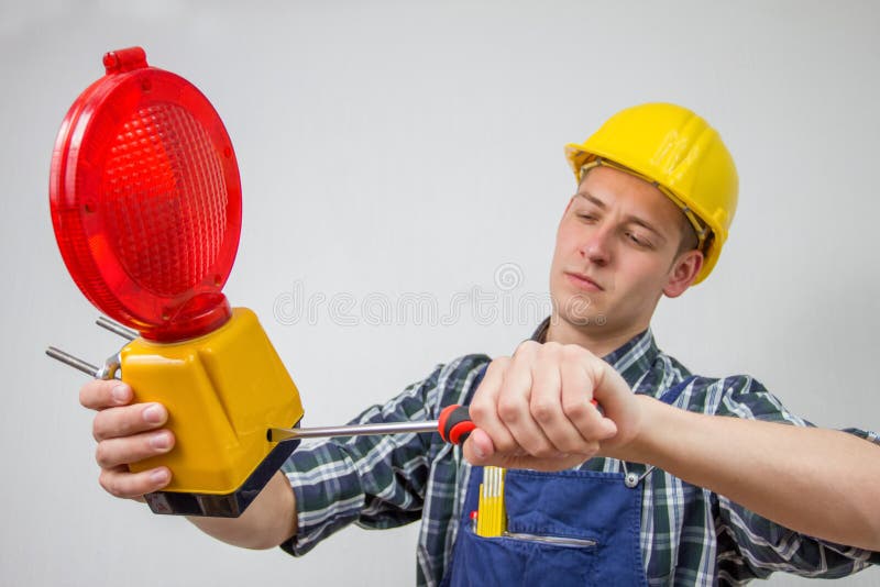 Construction Worker with a Red Construction Site-lamp Stock Photo ...