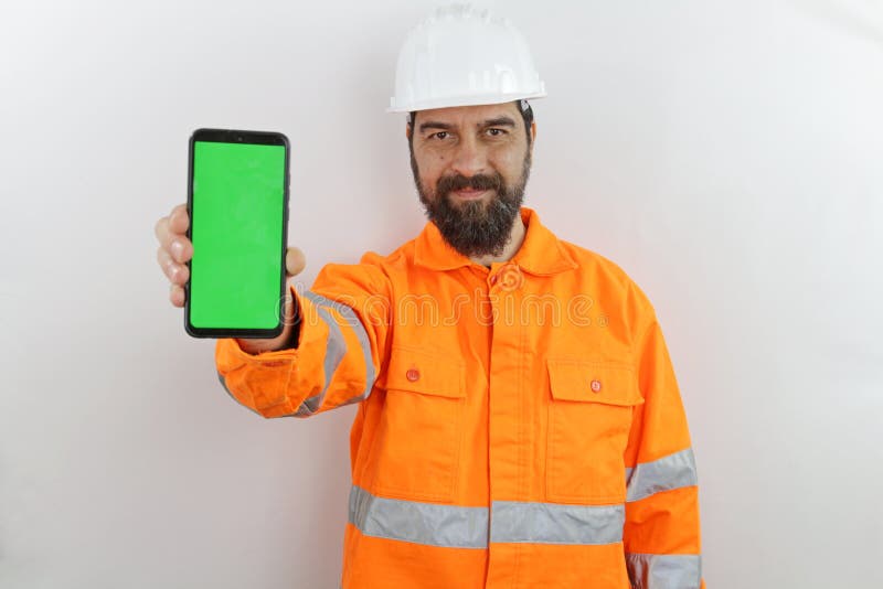Construction Worker with Reflecting Jacket Showing Cellphone Green ...