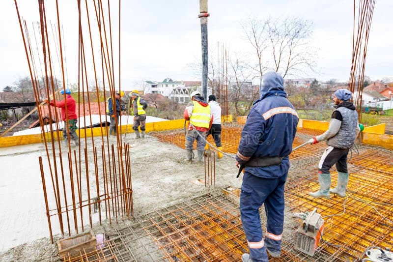 Pouring Fresh Concrete Over Reinforcing Steel, Armature Stock Photo ...