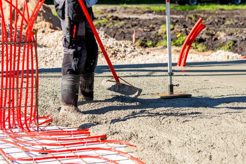 Pouring Concrete Over Underfloor Heating System Construction Process ...