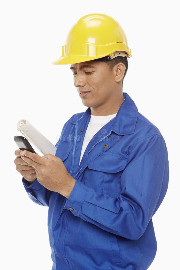Construction Worker Sending a Text Message Stock Image - Image of ...
