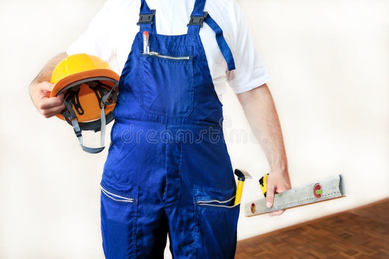 Construction Worker at Construction Site with Protective Uniform ...