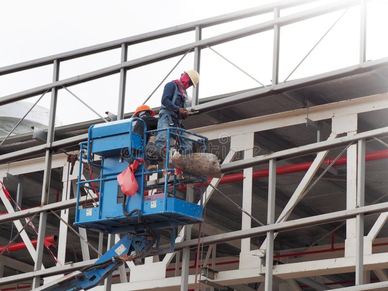 Man Working on the Working at Height on Construction Stock Photo ...