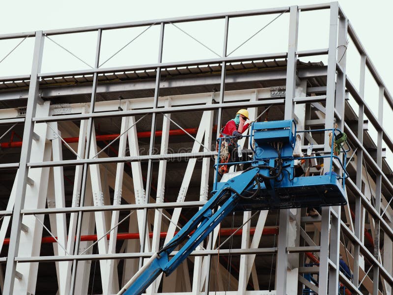 Man Working on the Working at Height on Construction Stock Photo ...