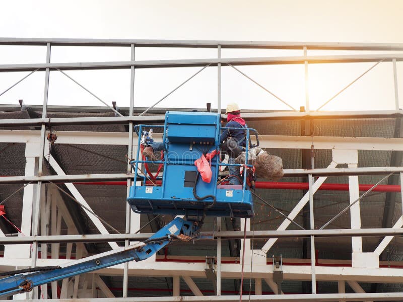 Man Working on the Working at Height on Construction Stock Photo ...