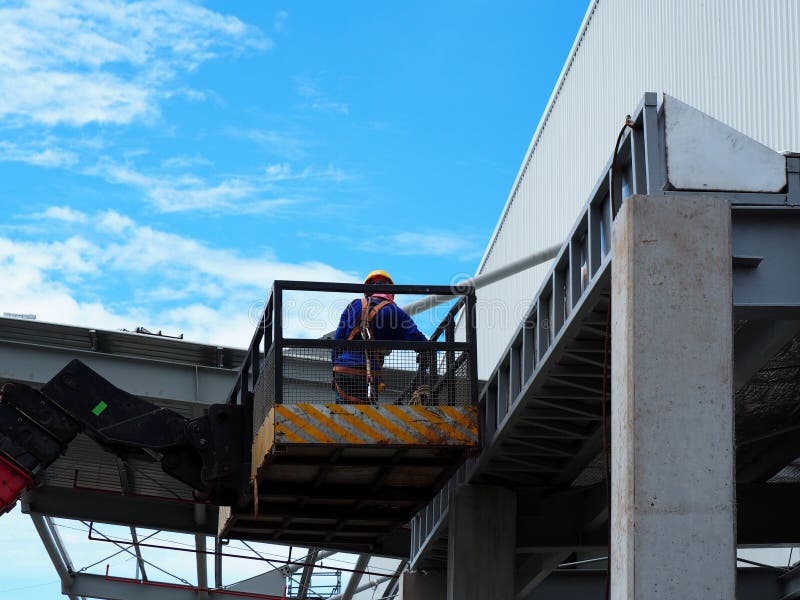 Man Working on the Working at Height on Construction Stock Photo ...