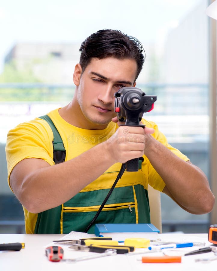 Construction Worker Sitting at the Desk Stock Photo - Image of ...