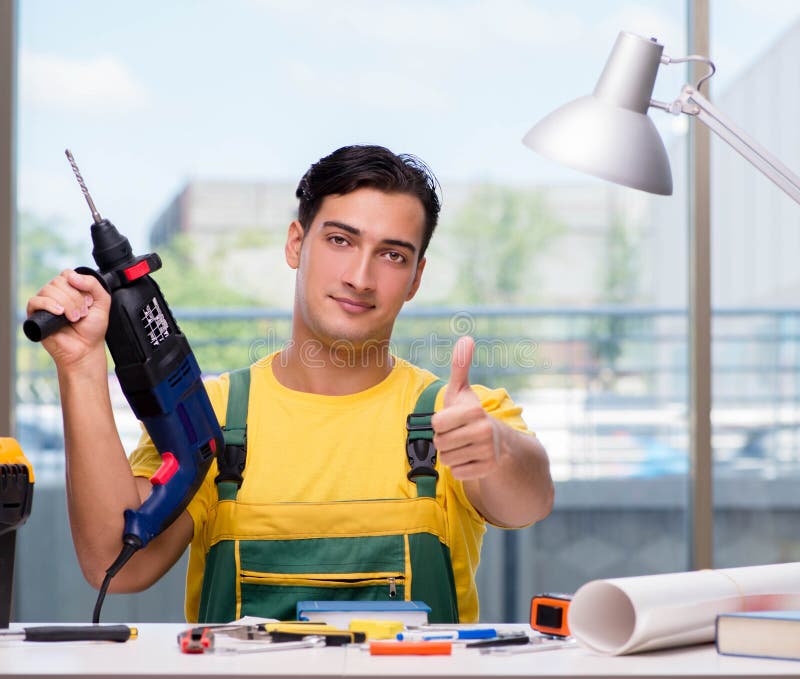 Construction Worker Sitting at the Desk Stock Image - Image of hole ...