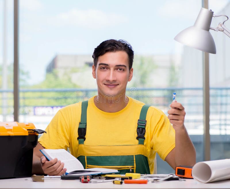Construction Worker Sitting at the Desk Stock Image - Image of ...