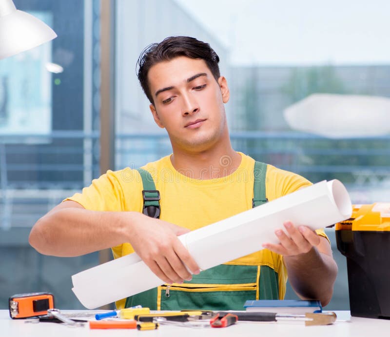 Construction Worker Sitting at the Desk Stock Photo - Image of manager ...