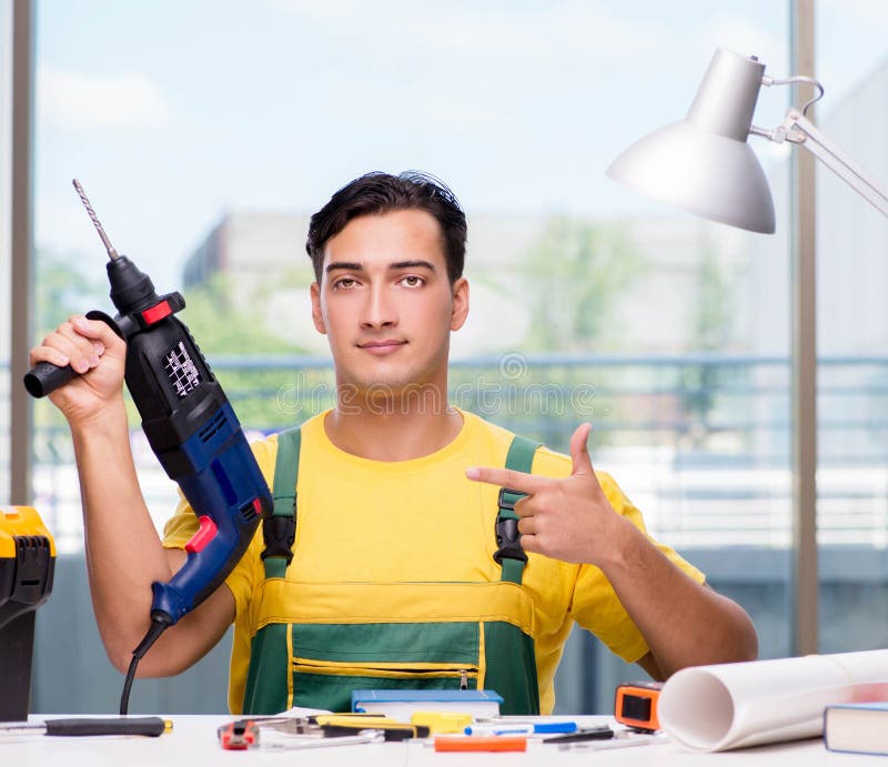 Construction Worker Sitting at the Desk Stock Image - Image of ...