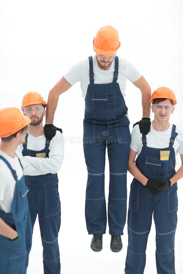 Construction Worker Sitting on the Shoulders of Colleagues Stock Image ...