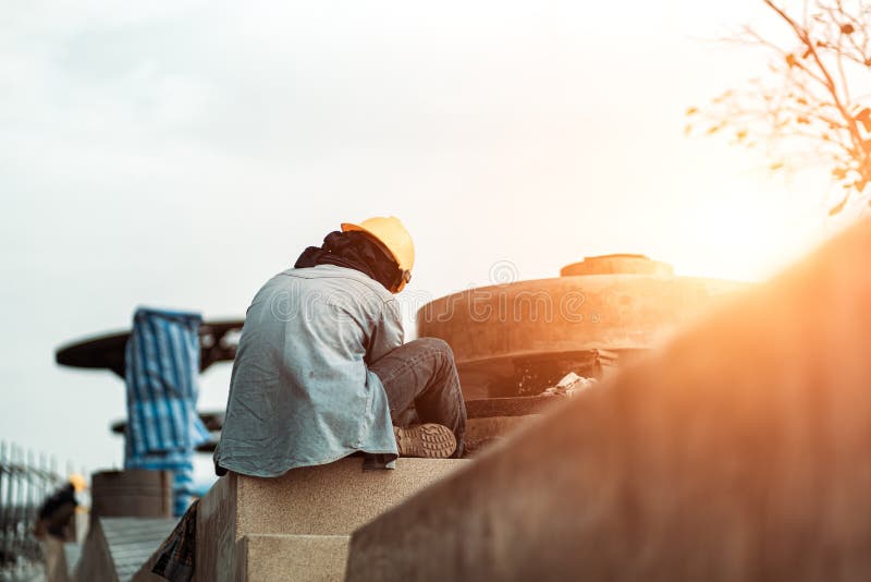 Construction Worker Sitting and Working at Site Construction at Island ...