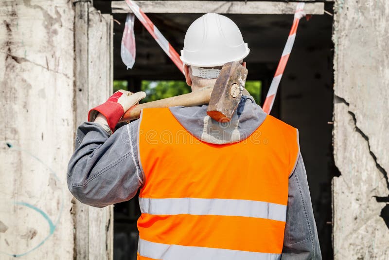 Man with sledge-hammer stock photo. Image of occupation - 35413470