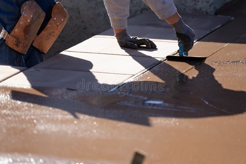 Worker Smoothing Concrete with a Power Trowel Stock Image - Image of ...